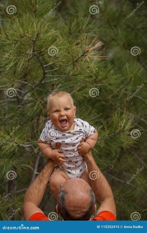 Portrait Of A Man With Her Son In Green Pine Forest Stock Image Image Of People Outside