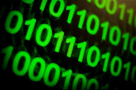 premium photo binary computer language monitor digits green