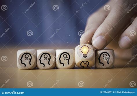 Hand Flipping Wooden Cube Block Human Thinking To Glowing Lightbulb For