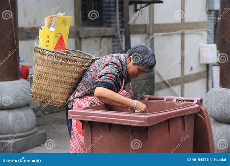 Chinese Old Man Trash Keeper Find And Pickup Recyclable Waste In Garbage Bin To Basket Of