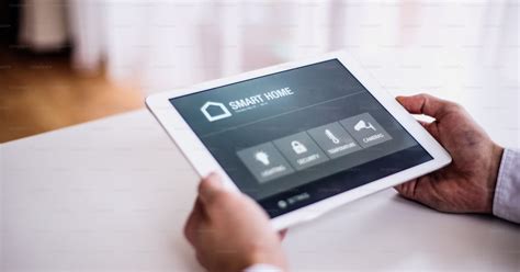 스마트 홈 제어 시스템이있는 태블릿 스마트 홈 제어 시스템이있는 태블릿 사진 Unsplash의 홈 오토메이션 이미지