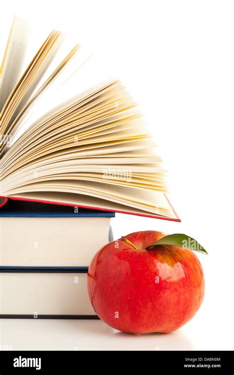 open book with stack of books with apple education and nutrition