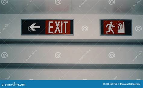 Exit Sign In Building Emergency Exit Indicator With Directional Arrow