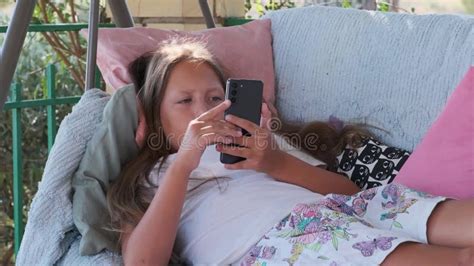 A Girl Is Playing Games In A Gadget Stock Video Video Of Concept