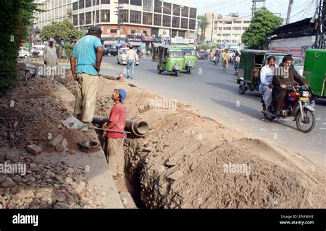Development Work For Laying New Drinking Water Pipeline Is In Progress Near Lahore Press Club On