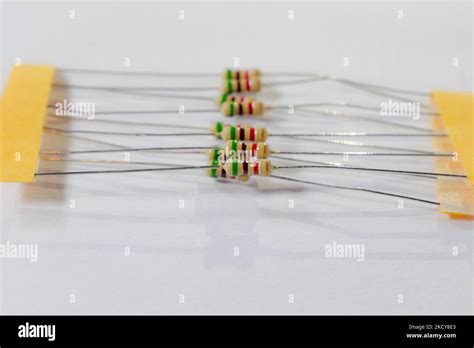 Set Of 10kilo Ohm Carbon Resistors Isolated Against White Background
