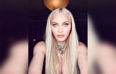 Singer Madonna Poses Topless At 62 Photos