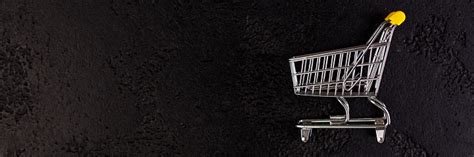 쇼핑 중독 구매자 쇼핑 개념입니다 클로즈업 위에서 검은 질감 배경에 고립 된 쇼핑 트롤리 공간을 복사합니다 배너 개념에 대한 스톡 사진 및 기타 이미지 Istock