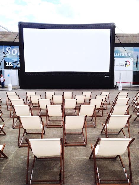 Premium Photo Built Structure With Windows In Background