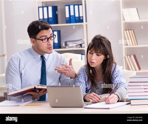 The Male Lecturer Giving Lecture To Female Babe Stock Photo Alamy
