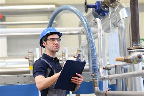 Assembler In An Industrial Plant Assembly And Repair On Site Stock