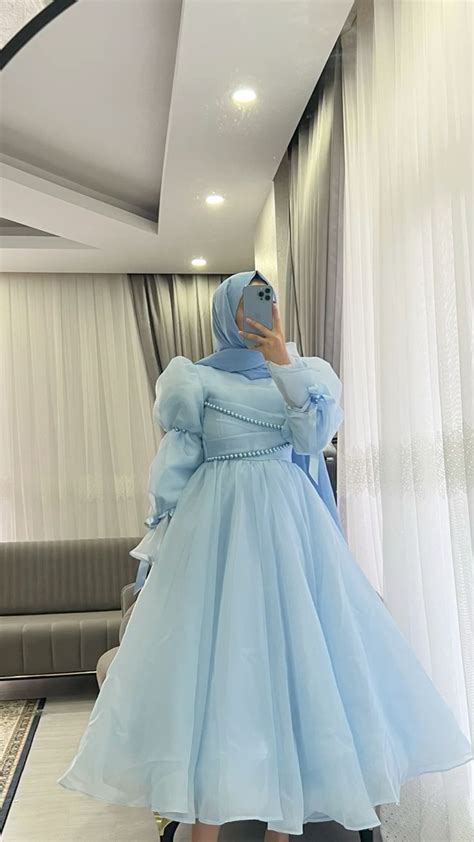 لشتاء 2026 فساتين خطوبة محجبات أجمل تصاميم بألوان بيبي بلو وشامبين