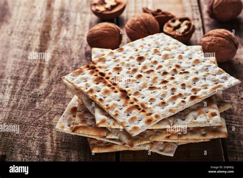 Matzah And Walnut Traditional Ritual Jewish Bread On Old Wooden Rustic