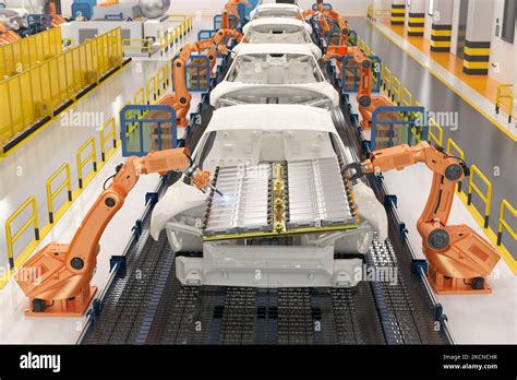 Automation Automobile Factory Concept With 3d Rendering Robot Assembly Line With Electric Car