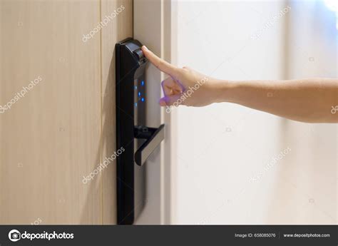 Hand Using Fingerprint Scan Smart Digital Door Lock While Open Stock Photo JoPanuwatD