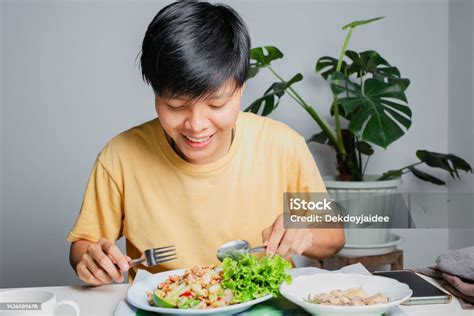 Asian Lesbians Smiling Happily On The Dining Table With Thai Food