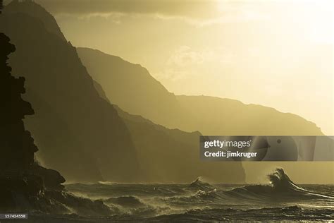 Sunset At Kee Beach Hawaii With Mountains In Background High Res Stock