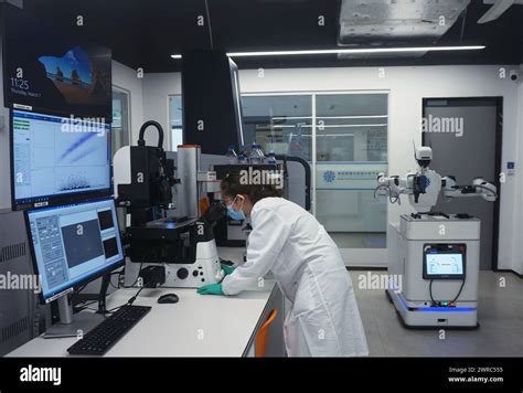 Hangzhou China March 7 2024 A Researcher Watches The Results Of Protein Analysis On A