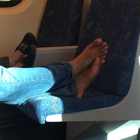 Go Train Rider Puts Feet On Seat Travel Off Path