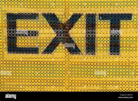 Exit Sign With Yellow Background Stock Photo Alamy