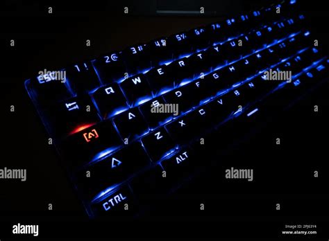 Illuminated RGB Gaming Backlit Keyboard With Red Caps Lock Button Stock Photo Alamy