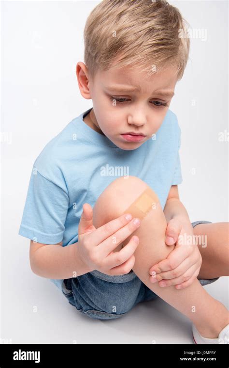Boy On His Knees Crying