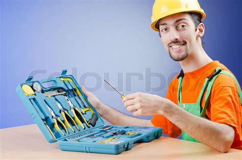Repairman With His Toolkit Stock Image Colourbox
