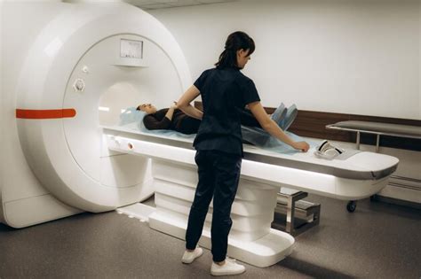 Premium Photo Doctor And Patient In The Room Of Computed Tomography At Hospital