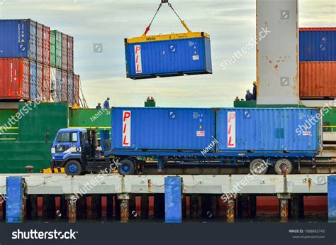 Labuanmalaysiamay 202021busy Crane Operator Unloading Container Stock Photo 1988865743