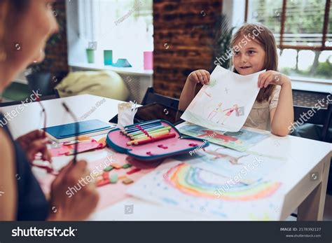 Girl Presenting Her Artwork Teacher Woman库存照片2178392127 Shutterstock