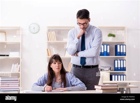 Male Lecturer Giving Lecture To Female Babe Stock Photo Alamy
