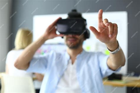 Premium Photo Young Male Software Programmer Testing A New App With 3d Virtual Reality Glasses