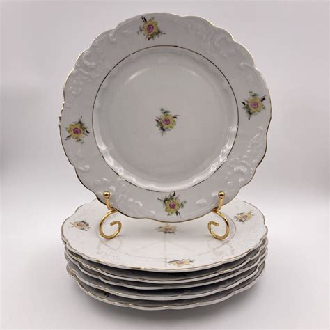 Набор обеденных тарелок на 6 персон украшенных изображениями желтых цветов фарфор деколь