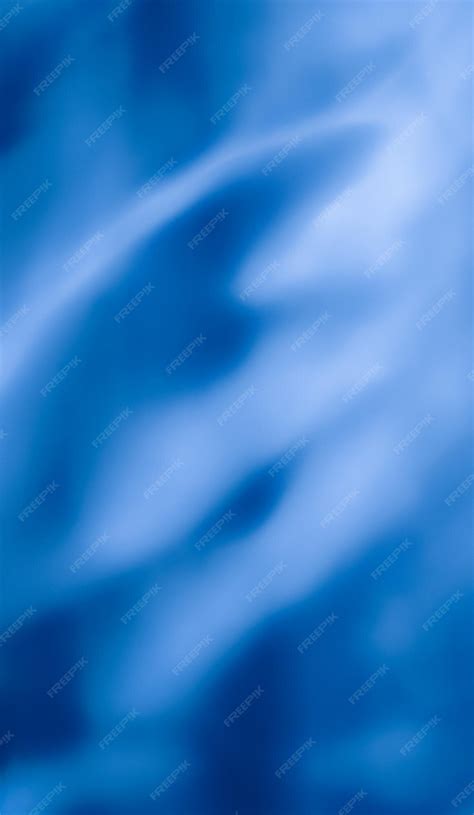 파란색 추상 예술 배경 실크 질감과 고전적인 고급 디자인을 위한 물결선 프리미엄 사진