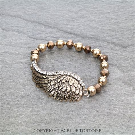 Western Wing With Bead Stretch Bracelet Bluetortoisewholesale