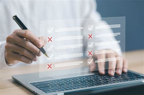 Person Ticks The Checkmark In The Box On The Laptop Checklist Processes The Order Concept
