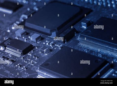 Closeup Of Printed Circuit Board With Processor Integrated Circuits And Many Other Surface