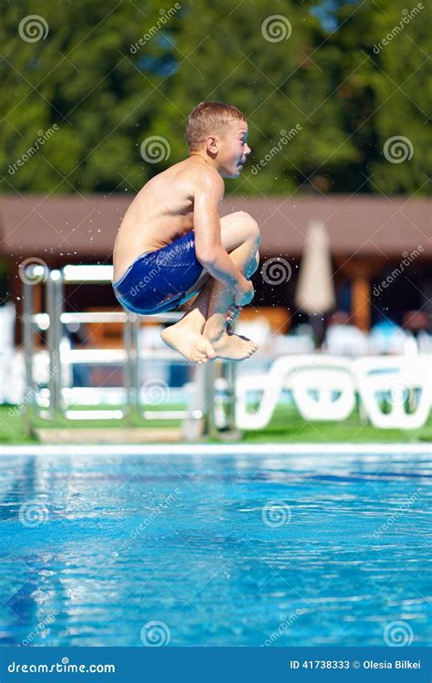 Excited Teenage Boy Jumping In Pool Stock Image Image Of Heat