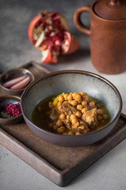 Premium Photo Arabic Platter And Grey Background Hummus And Vegetables Platter Tea Pot And