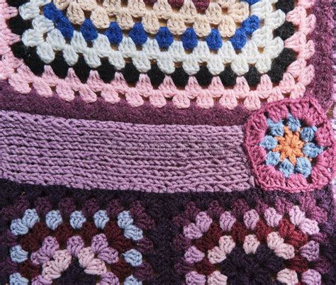 Colourful Patchwork Fabric Is Sewn With Granny Squares Patterns Stock Colourful Patchwork Fabric Is Sewn With Granny Squares Patterns Stock
