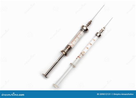 Two Reusable Injection Syringes Isolated On White Background Place