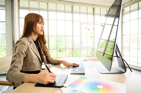 Asian Female Artist Drawing Something On Graphic Tablet Graphic Designer Working At Office