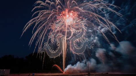 Dragon Shaped Fireworks Display Lights Up The Night Sky During Festival