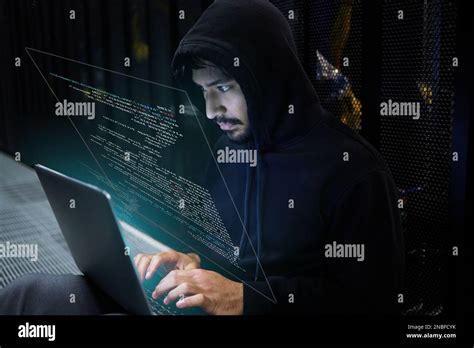 Cyber Security Coding And Hacker In Server Room With Hologram Laptop