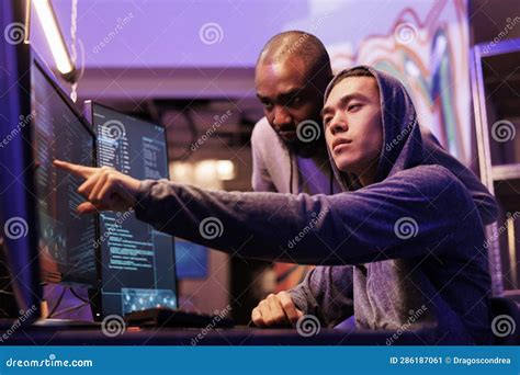 hacker pointing at malware on screen stock image image of american
