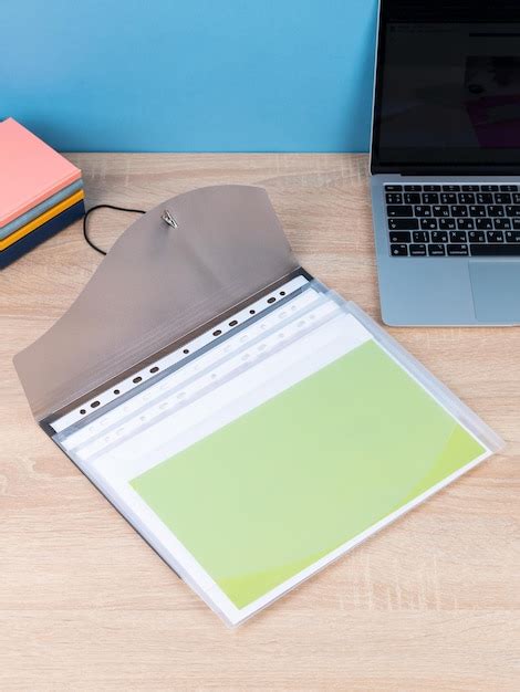 premium photo close up of the folder a notebook on a wooden table are