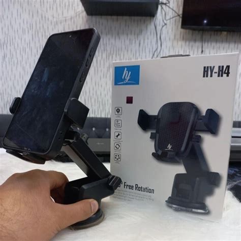 خرید و قیمت هولدر نگه دارنده گوشی بر روی میز داشبورد و شیشه اتومبیل ترب