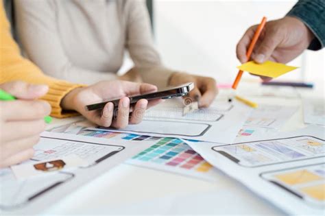 Collaborative Ux Ui Design Process With Team Working On Mobile App Prototypes And Wireframes