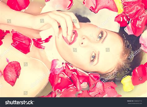 Lady Laying Red Rose Petals Water Over Royalty Free Licensable Stock Photos Shutterstock