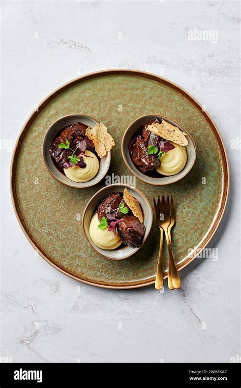 Slow Cooked Beef Cheek Parsnip Mash Red Wine Jus Seeded Mustard